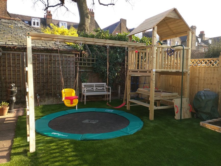 Tower with Swing Extension and Sand Pit Over In Ground Trampoline